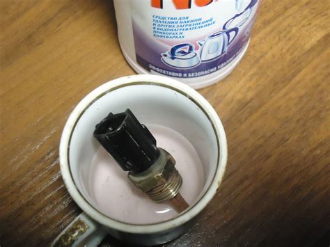 Replacing The Coolant Temperature Sensor In The Mitsubishi Lancer 9