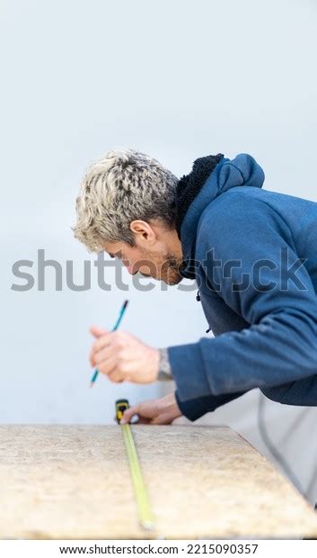 Man Using Tape Measure Drawing Line Stock Photo Shutterstock