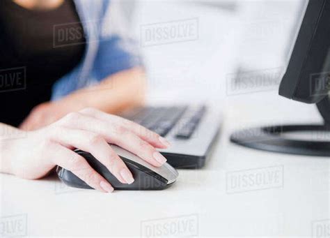 Close Up Of Korean Woman Using Computer Mouse Royalty Free Stock Photo Dissolve