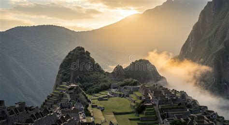 Machu Picchu A Unesco World Heritage Site Is Depicted At Sunrise
