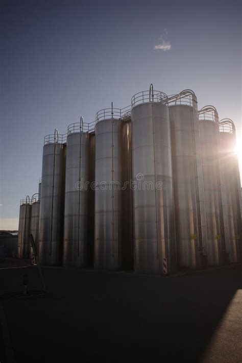 Industrial Silos With Sunbeam And Blue Sky Stock Image Image Of