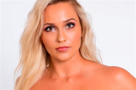 Premium Photo Portrait Of A Beautiful Blonde Woman With Brown Eyes Ui Exposed Arms