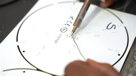 Engineer Pre Soldering Connection Points On Electric Device High Angle Close Up Stock Footage