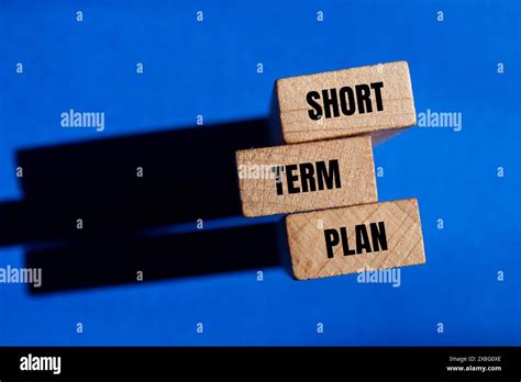 Short Term Plan Words Written On Wooden Blocks With Blue Background