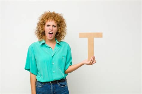 Premium Photo Portrait Of A Woman On A Grey Background