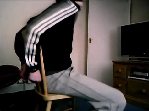 Handcuffed To A Chair En Español