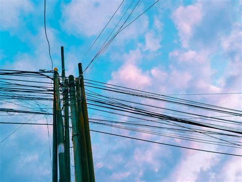 Photo Of Messy Electrical Cables Photographed Under Clear Skies Urban