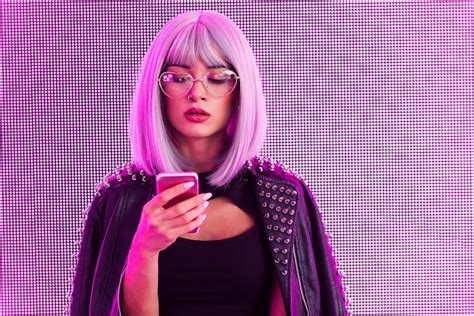 Premium Photo Pretty Girl With Stylish Clothes Posing Near Led Lights