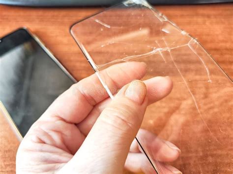 Removing Protective Film From A Cracked Screen Peeling Off A Cracked