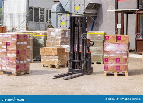 Transportation Of Pallets With A Brick Using A Loader Editorial Image 213766318