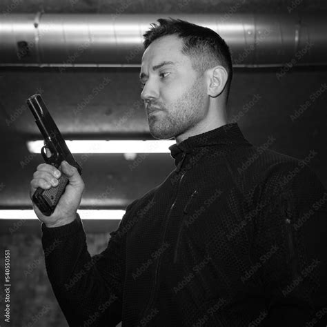 Man With Gun Stock Photo Adobe Stock