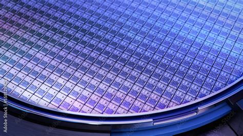 Macro Shot Of A Silicon Wafer With Computer Chips During Manufacturing