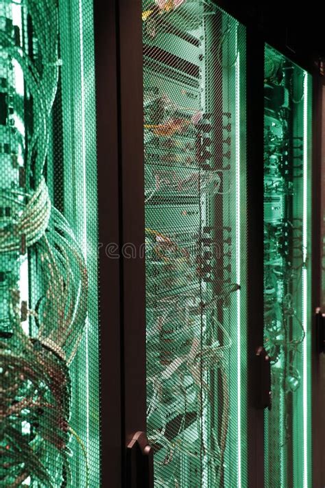 Data Center With Multiple Rows Of Fully Operational Server Racks Cloud Database Super Computer