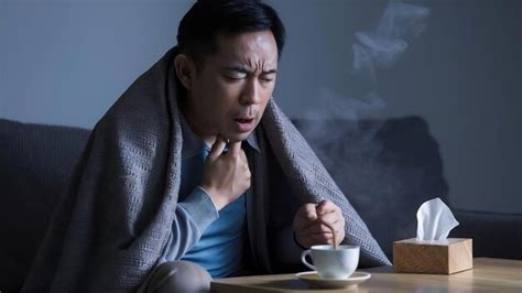 premium photo adult asian man got sore throat and coughing
