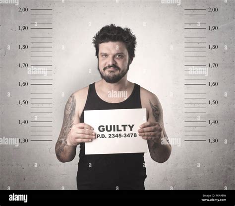 Caught Guilty Man With ID Signs On His Hand Stock Photo Alamy