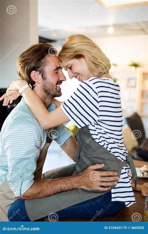 Spontaneous Romantic Couple Making Love In Kitchen While Preparing Food Stock Image Image Of