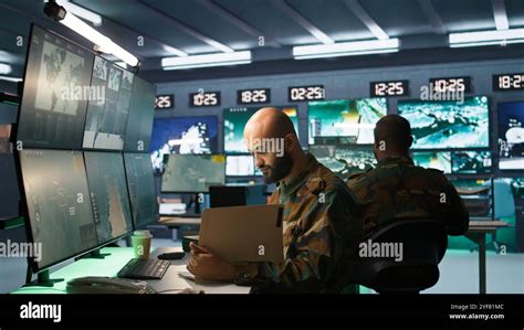 Soldier Doing Patriotic Duty In Military Hq Base Gathering Information On Enemy Troops Officer