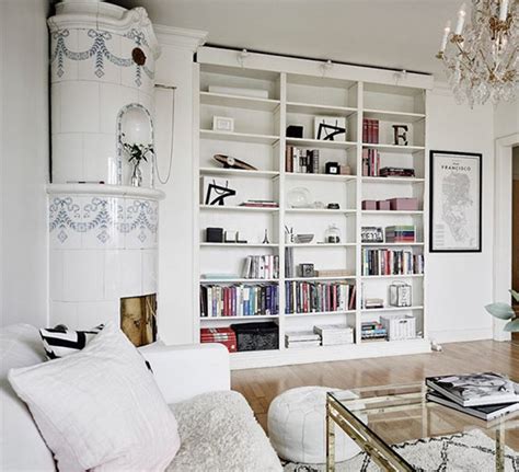 Книжные стеллажи в интерьере 24 фото