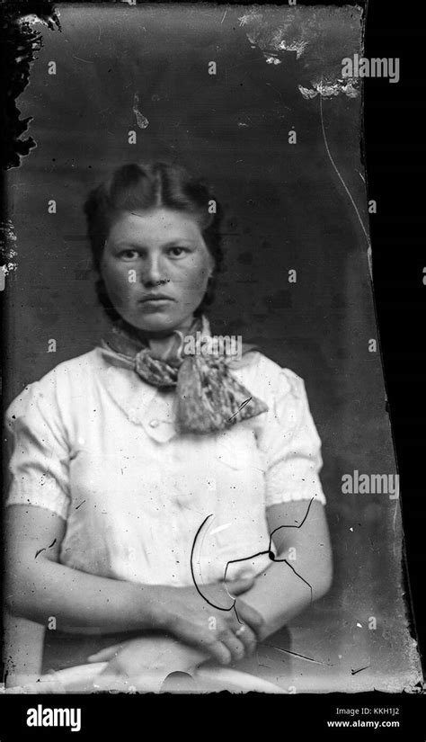 This Image Titled Femeie CA 20131211 Depicts A Woman Captured In A Moment Of Daily Life The