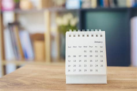 2022 달력 책상 테이블에 배치 플래너를 위한 데스크탑 캘린더는 나무 사무실 테이블에서 의제 이벤트 시간표 약속 조직 관리