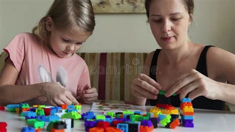 A Mother And Daughter Engage In Imaginative Play With Building Blocks Stock Video Video Of
