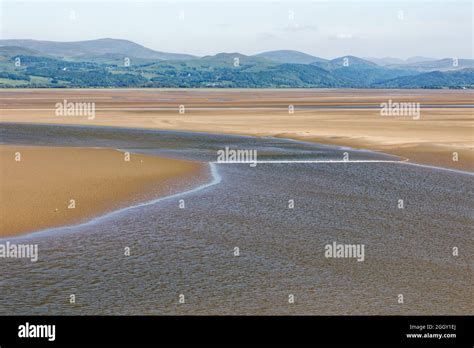 The Duddon Tidal Bore And Lake District Fells Viewed From Dunnerholme