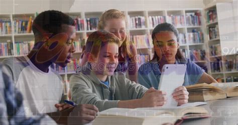 Animation Of Continue Text Over Diverse Students Using Tablet Stock