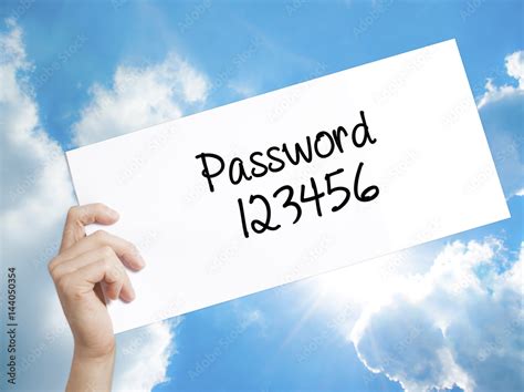 Password Sign On White Paper Man Hand Holding Paper With Text Isolated On Sky
