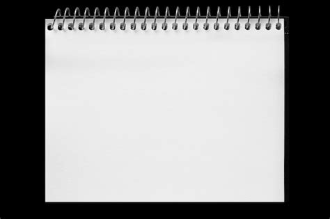 Premium Photo A Paper Page Notebook Isolated On The Black Background