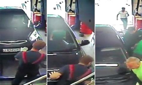 Confused Female Driver Hits The Accelerator And RUNS OVER A Mechanic Daily Mail Online