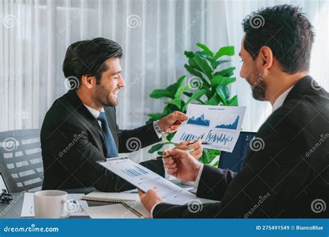 Busy Analyst Team Discussing Financial Data On Laptop Fervent Stock Image Image Of