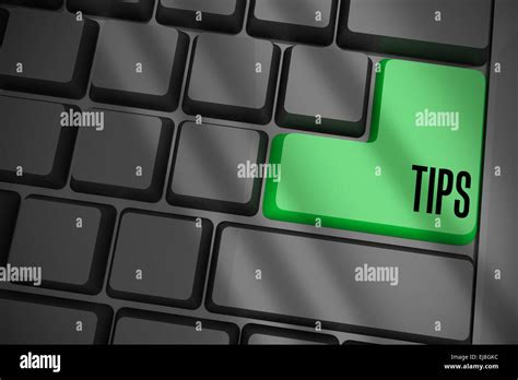 Tips On Black Keyboard With Green Key Stock Photo Alamy