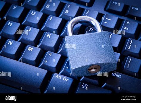Cyber Security Concept Closed Padlock On The Computer Keyboard Cloud Data And Work From Home