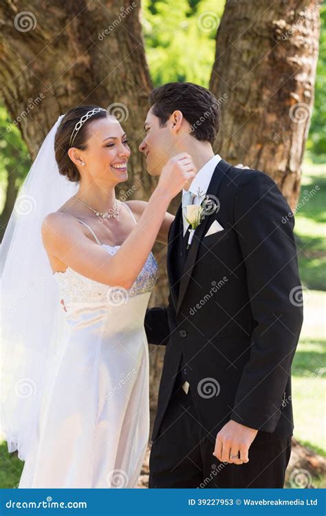 Newly Wed Couple About To Hug In Garden Stock Image Image Of