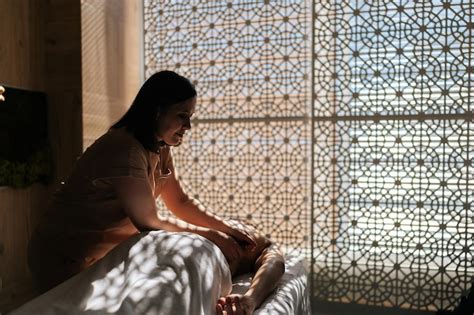 Premium Photo Medium Shot Of Friendly Female Massage Therapist Giving