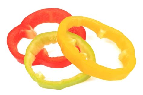 Fresh Pepper Slices Isolated On White Premium Photo