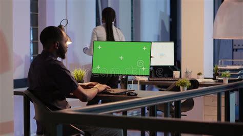 Startup Worker Analyzing Greenscreen On Monitor In Office With Big Windows Stock Video Video