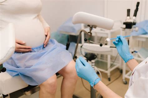 Gynecologist Testing Vaginal Swab For Std In The Clinic Gynecologist