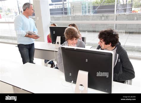 Teacher Desk Youth Adult Computing Class Training Desktop Babes Adults Stock Photo Alamy