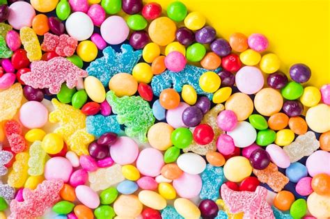 Premium Photo Candy On The Table Colorful Sweet Candy Background