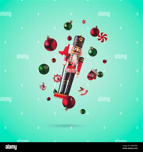 Nutcracker And Christmas Baubles On Green Background Levitating Christmas And New Year