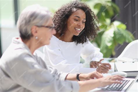 Premium Photo Software Development Team Discussing Algorithms On