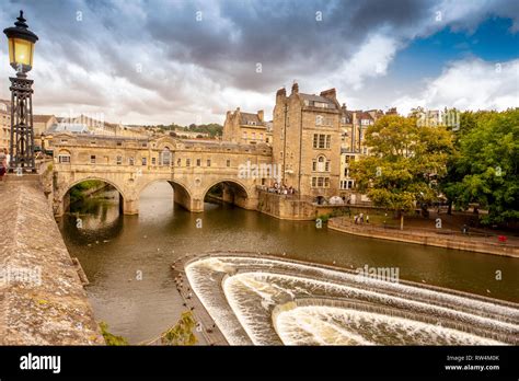 The Historic Pulteney Bridge Over The River Avon And Pulteney Weir In