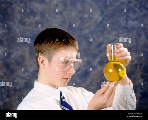 Potassium Chromate Solution Schoolboy Holding Up A Round Bottomed