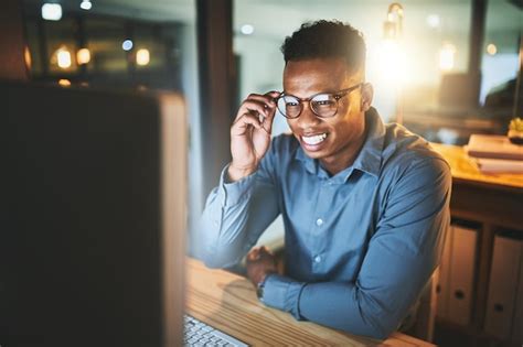Premium Photo Office Computer And Happy Businessman At Night For Website Research And Web