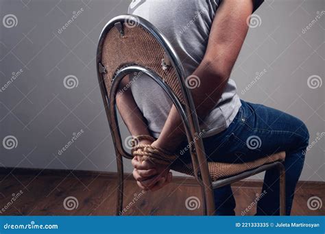 A Man Is Tied On A Table With A Rope Stock Image Image Of Concept Help