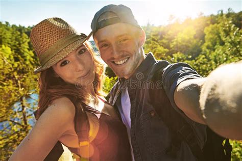 Never Give Up On The Things That Make You Smile A Young Couple Taking