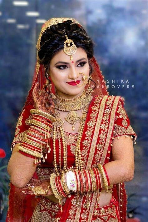 Pin On Brides Indian Bride Photography Poses Indian Bridal Photos Indian Wedding Couple
