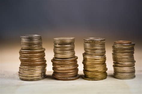 premium photo stack of coins on table