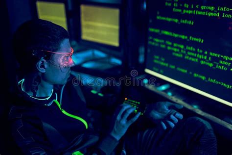 cyber hacker breaks into databases to obtain information using a